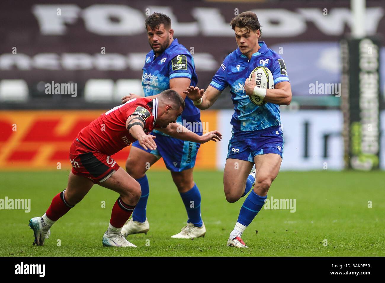 Swansea, Wales, UK. 12th April, 2025. Jack Walsh of Ospreys makes a ...
