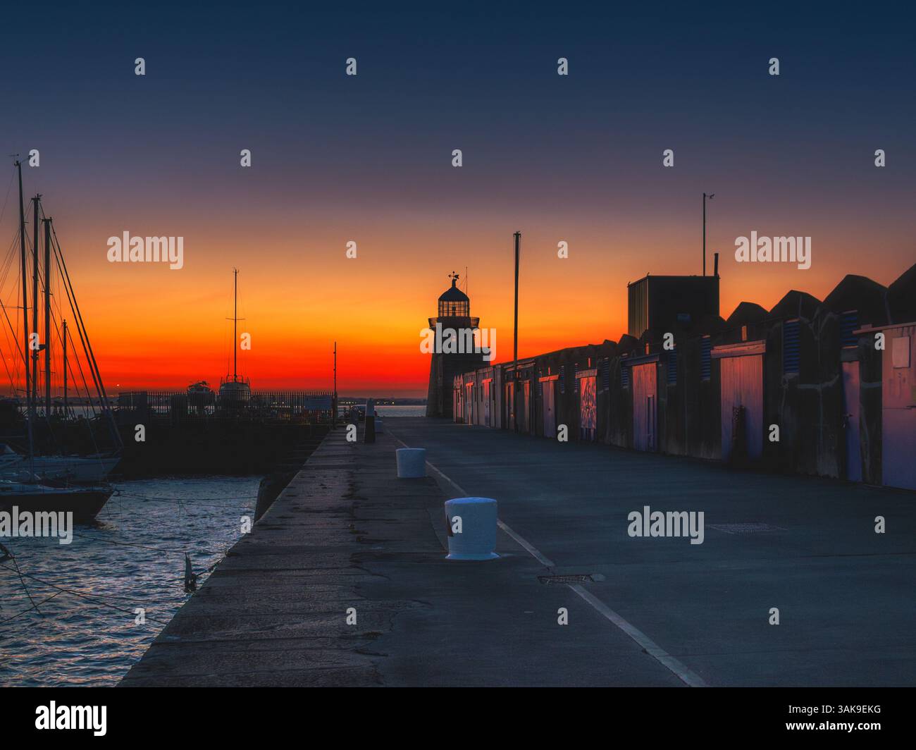 Sunset afterglow at Howth east pier Stock Photo - Alamy