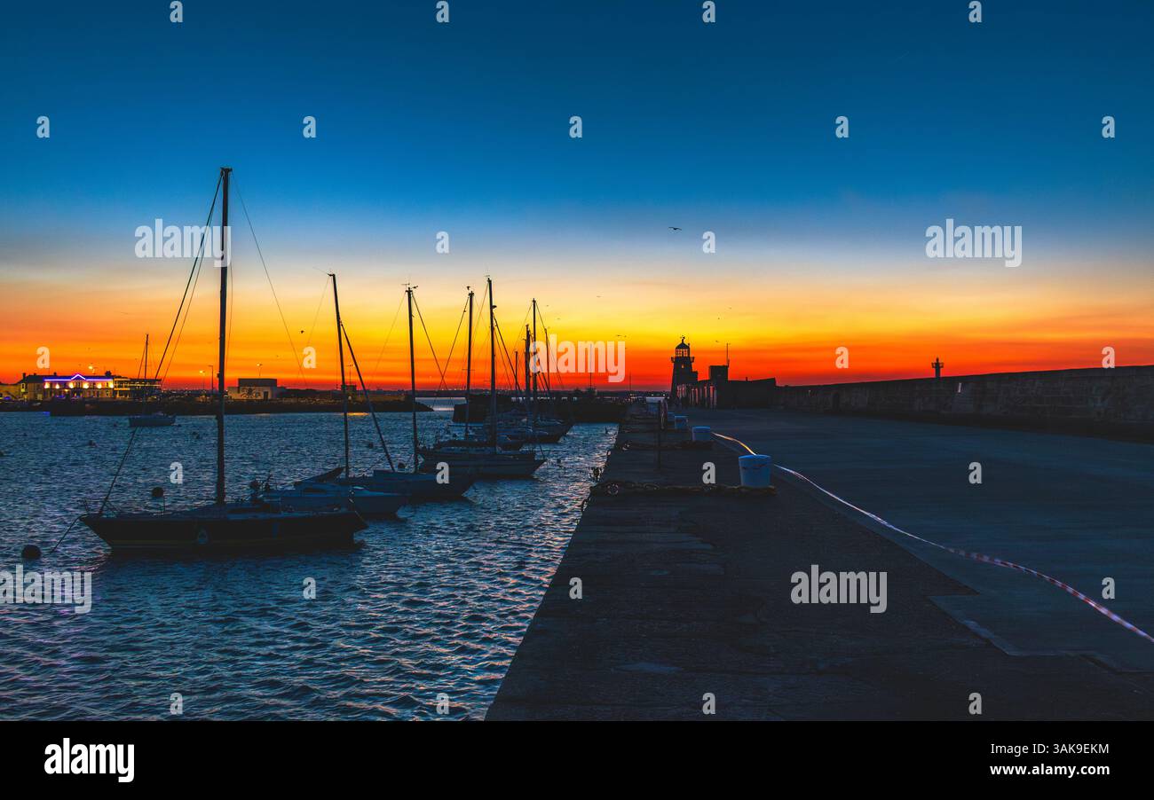 Sunset afterglow at Howth east pier Stock Photo - Alamy