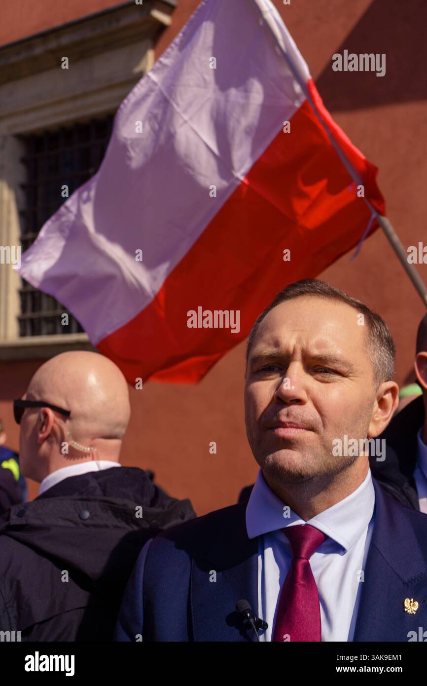 Presidential candidate Karol Nawrocki sings the Polish national anthem during an election rally ...