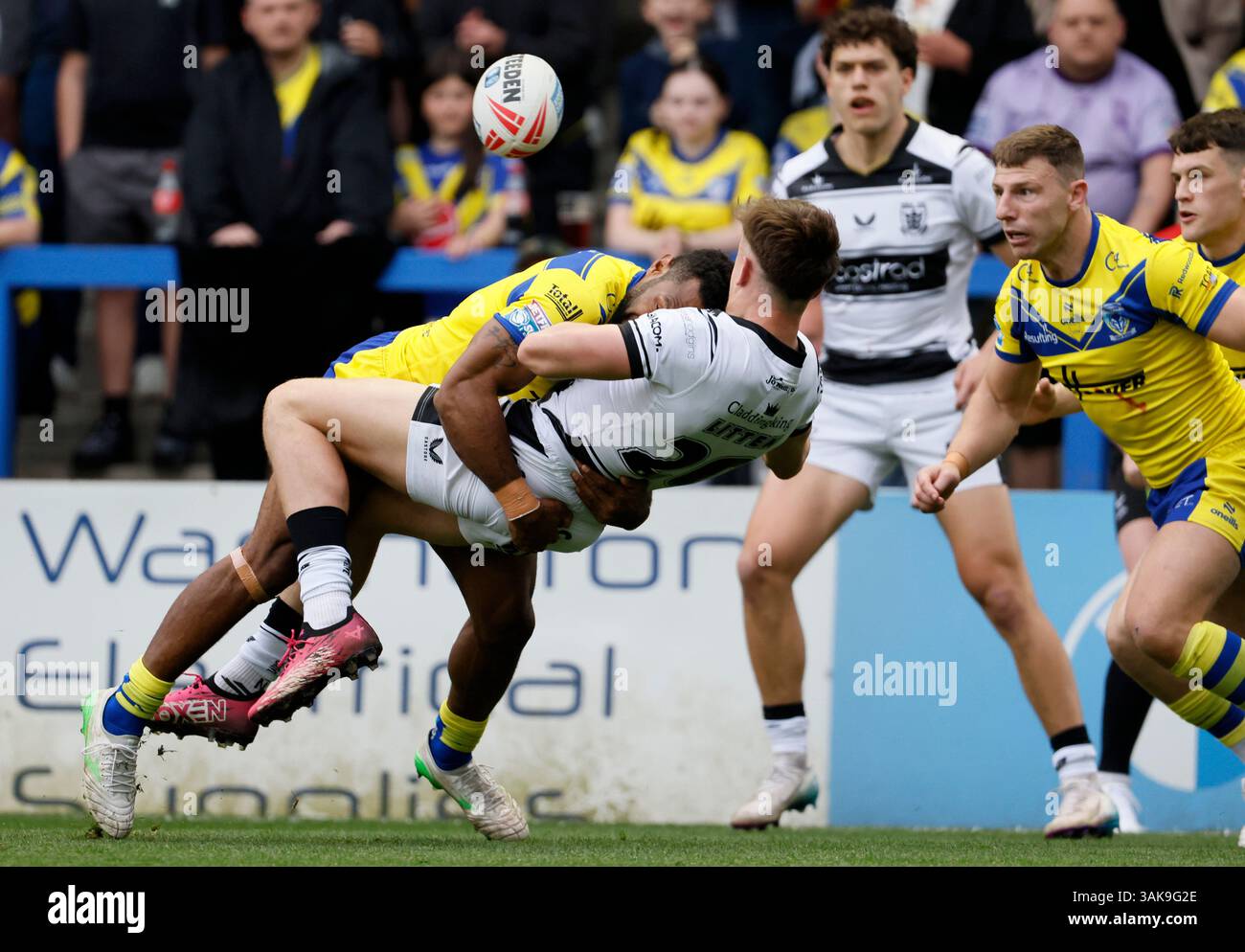 Hull FC's Davy Litten (centre right) is tackled during the Betfred ...