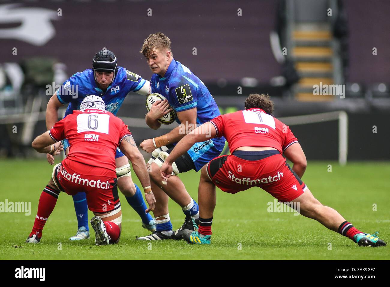Swansea, Wales, UK. 12th April, 2025. James Fender of Ospreys carries ...