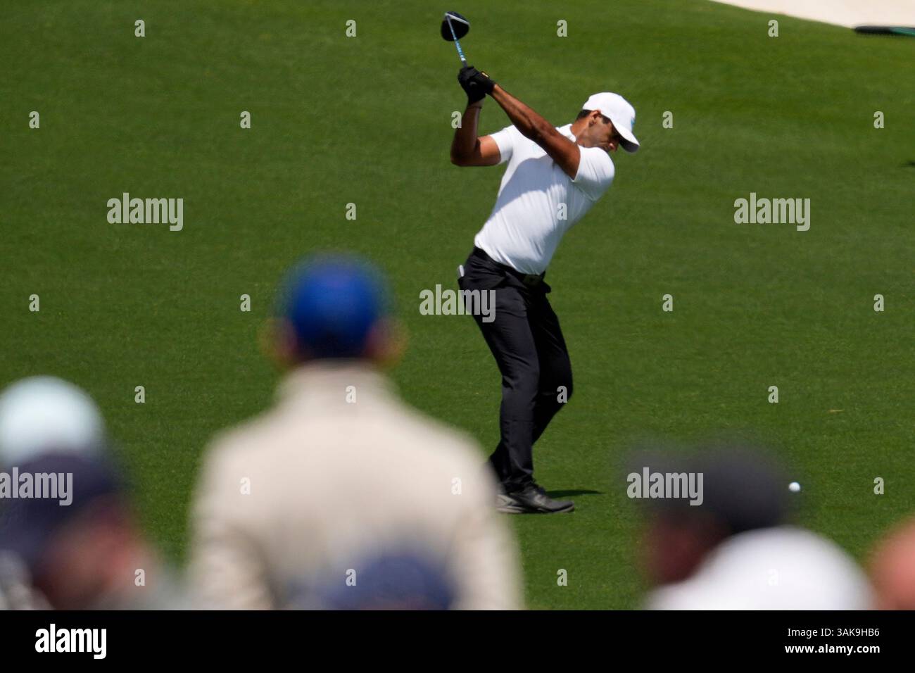 Aaron Rai, of England, hits from the fairway on the eighth hole during ...