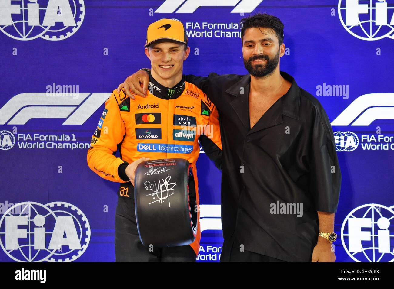 Sakhir, Bahrain. 12th Apr, 2025. (L to R): Oscar Piastri (AUS) McLaren ...