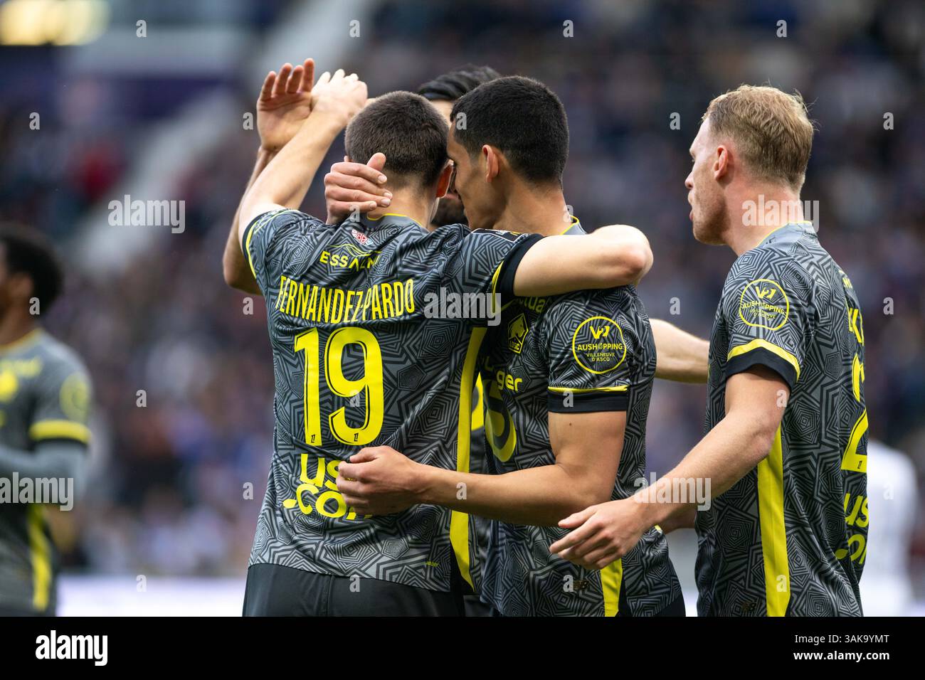 Mathias Fernandez Pardo and team of Lille celebrating during the French ...
