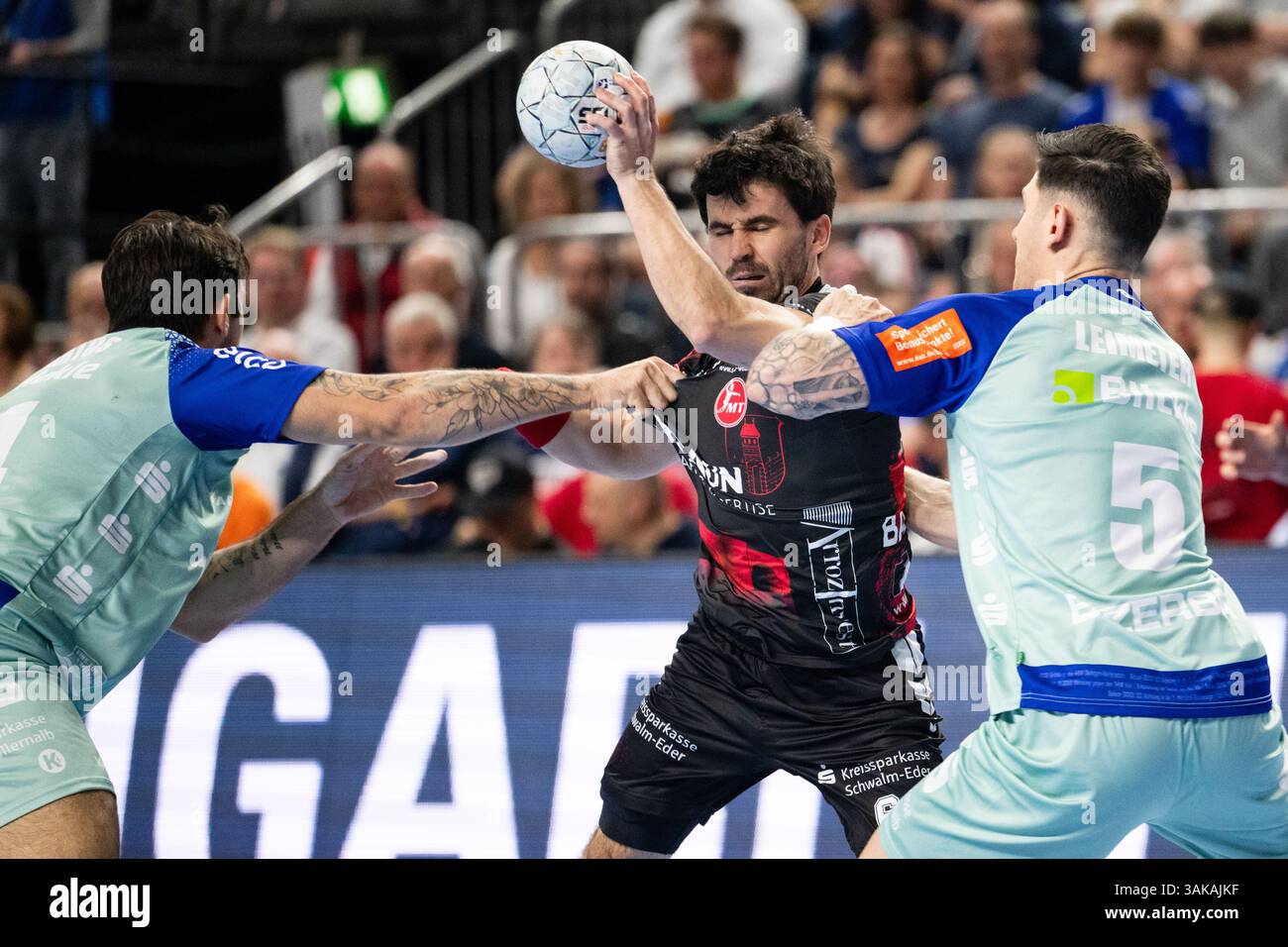 Cologne, Germany. 12th Apr, 2025. Handball: DHB Cup, MT Melsungen - HBW ...