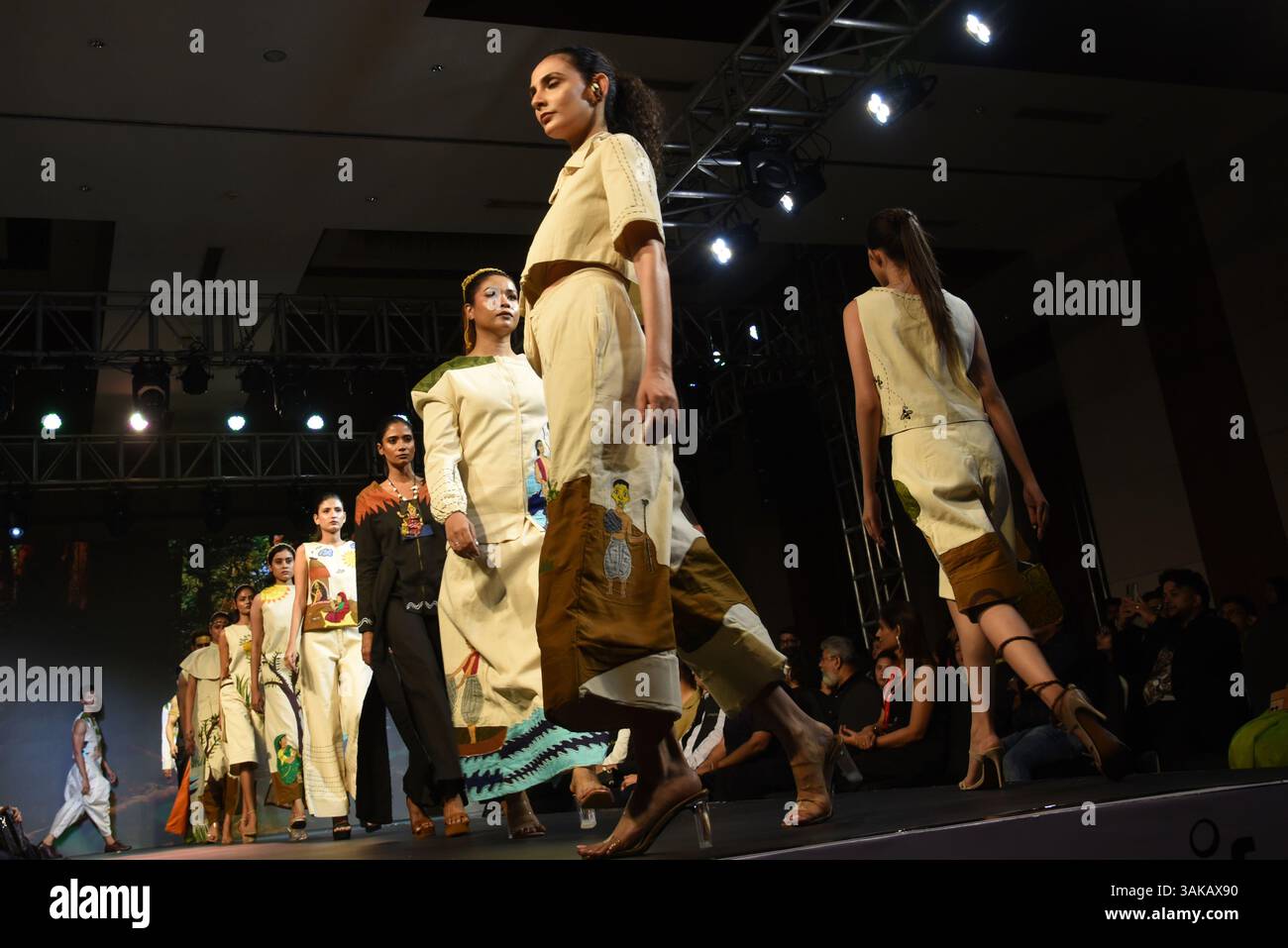 Indian models display the new summer collection at the NIF Global Elixir 2025 Fashion Show in ...