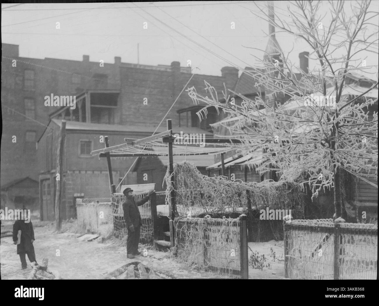 A historical photograph documenting the aftermath of a fire at a ...