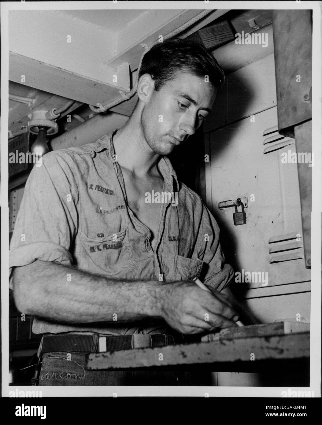 Melvin K. Pearson, a Coast Guardsman and carpenters' mate first class ...