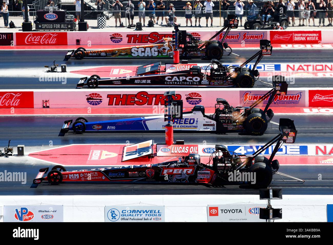 LAS VEGAS, NV - MARCH 05: Scott Palmer (5050 TF, near lane) NHRA Top Fuel Dragster, Shawn Reed ...