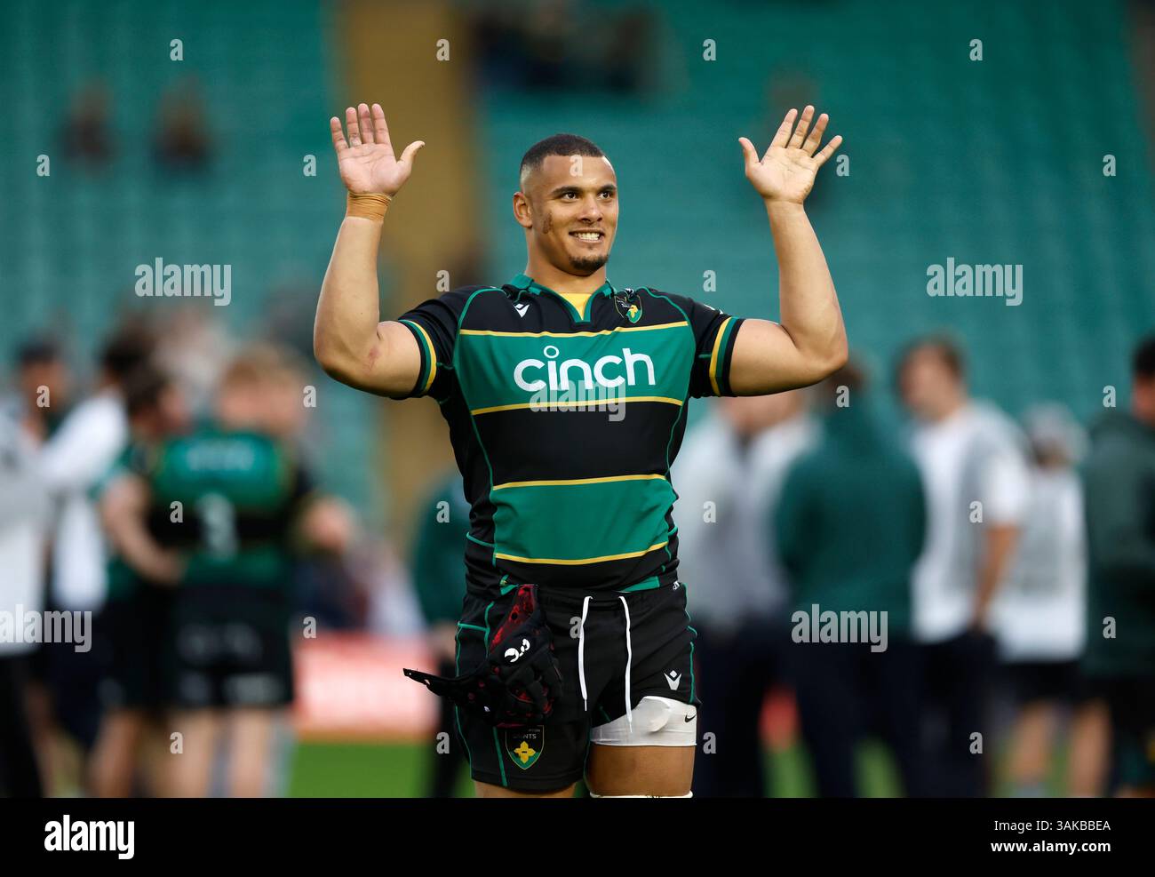 Northampton Saints' Juarno Augustus salutes the fans following the ...