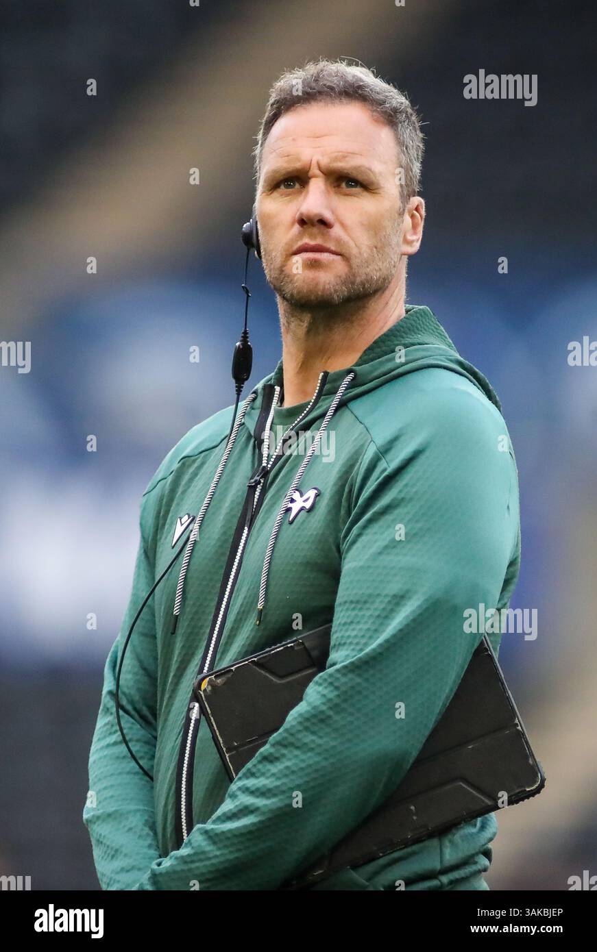 Swansea, Wales, UK. 12th April, 2025. Ospreys Head Coach Mark Jones ...