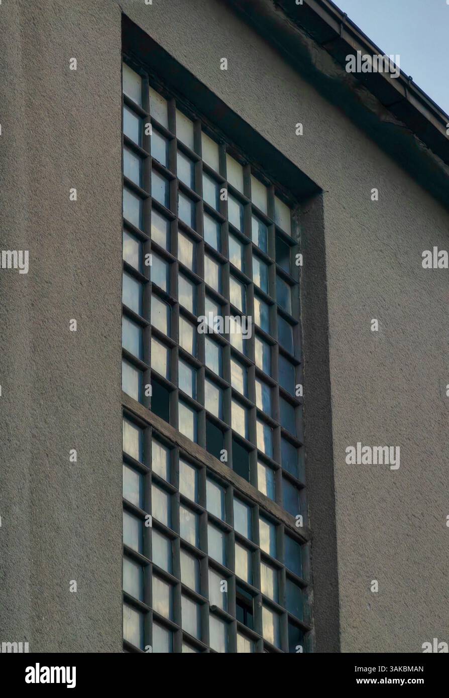 Echoes Through the Grid: Old Building Window Frame Stock Photo - Alamy