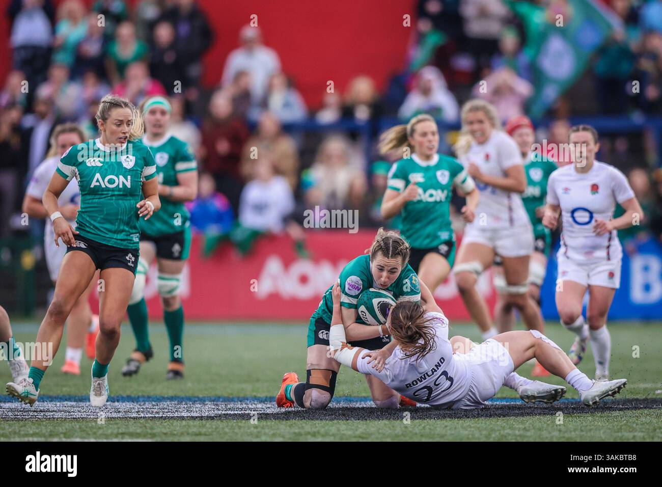 Cork, Ireland. 12 April, 2025. Eve Higgins of Ireland is tackled by ...