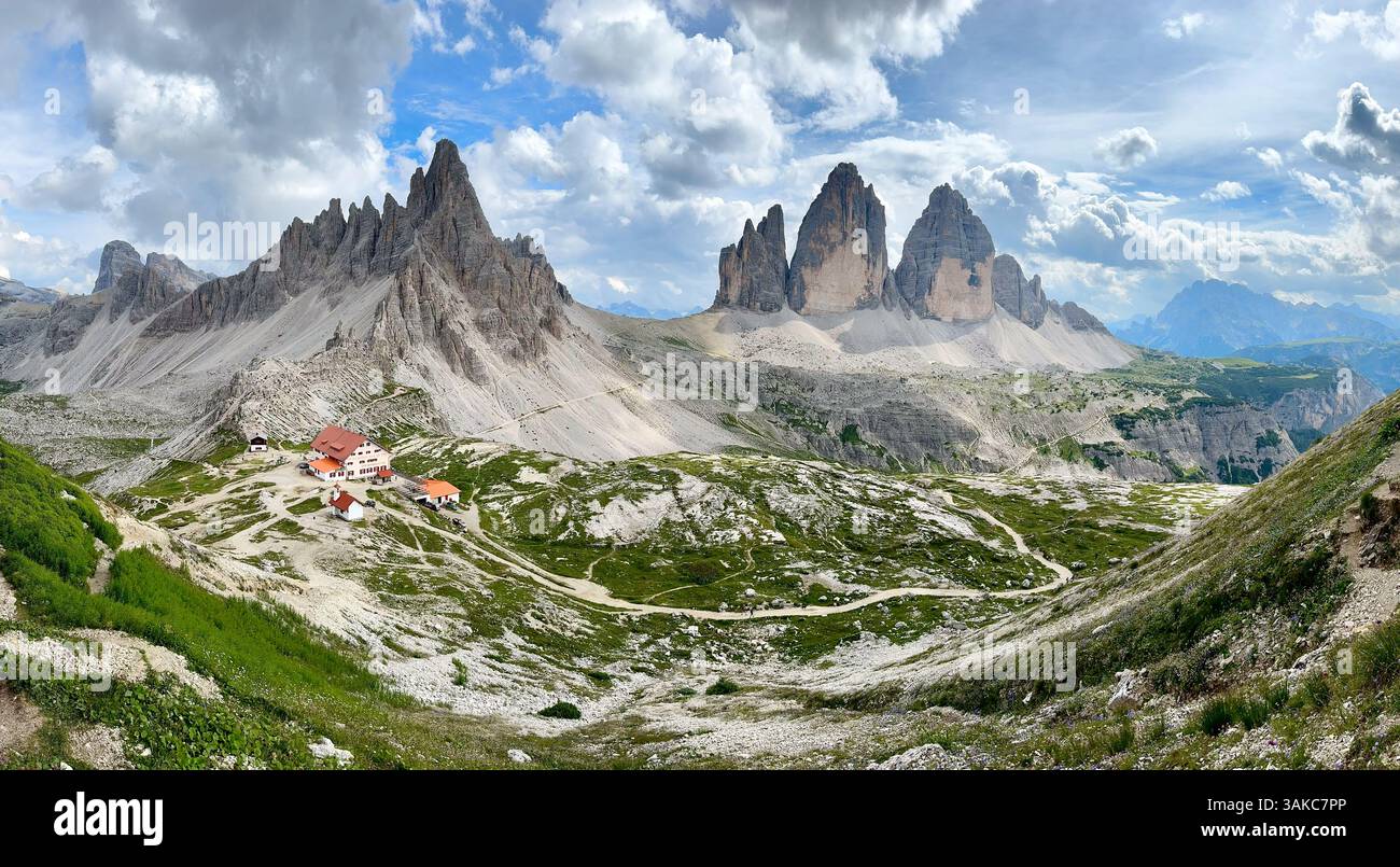 Famous mountain range Tre Cime di Lavaredo with surrounding peak monte ...