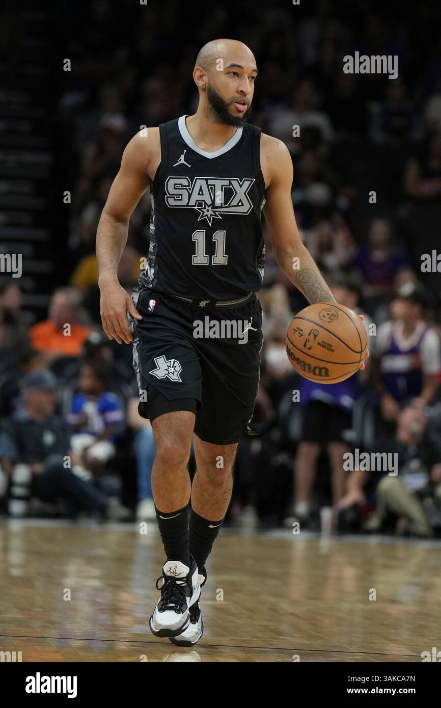 San Antonio Spurs guard Jordan McLaughlin (11) against the Phoenix Suns ...