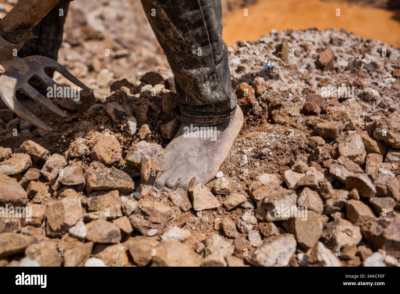 Stone breakers in Uganda, Africa Stock Photo - Alamy
