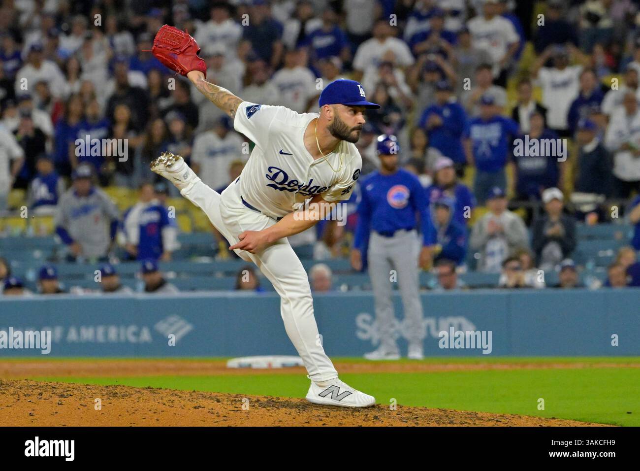 Los Angeles Dodgers relief pitcher Tanner Scott delivers to the plate ...