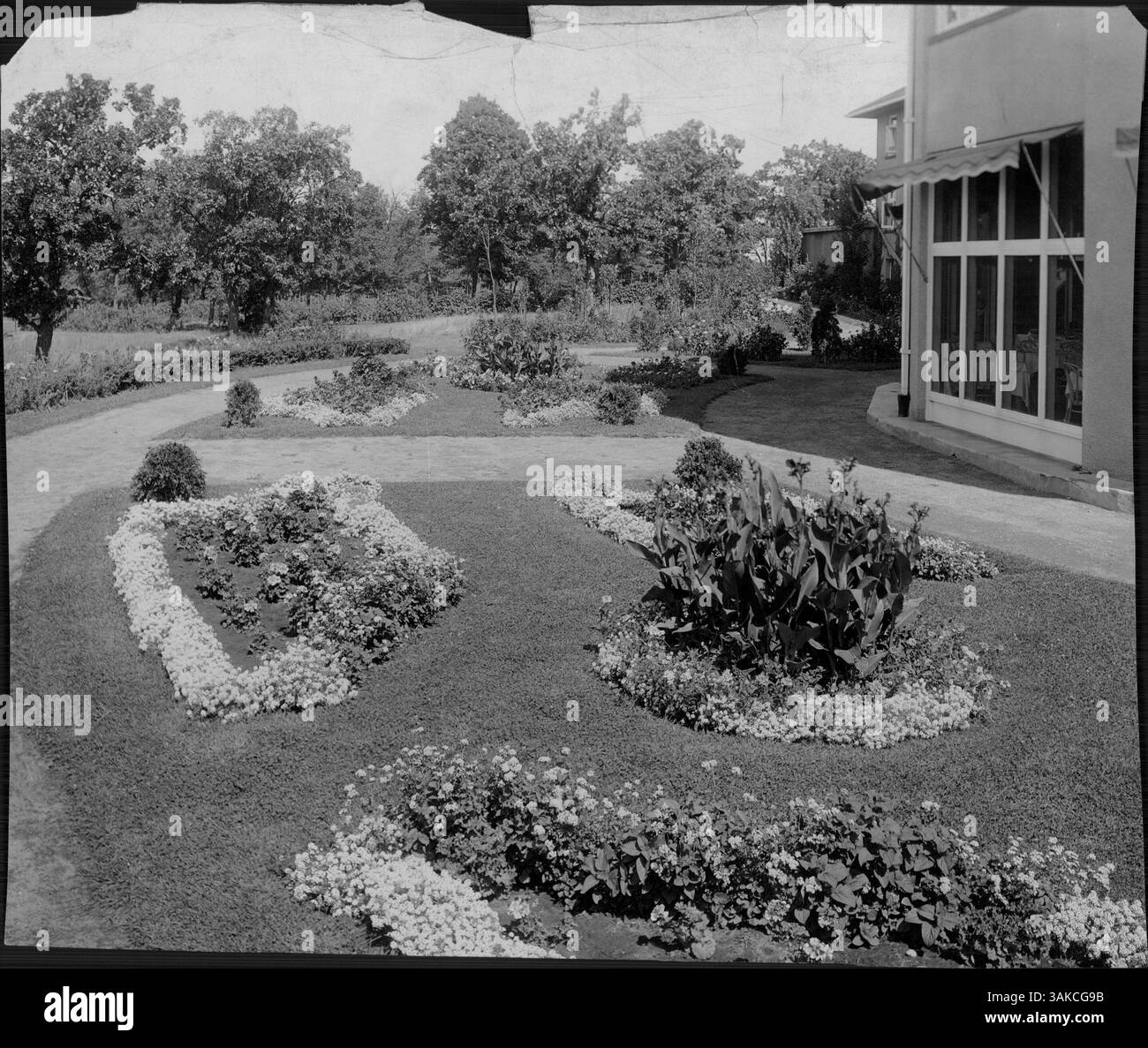 This image shows the flower gardens on the terrace behind the ...