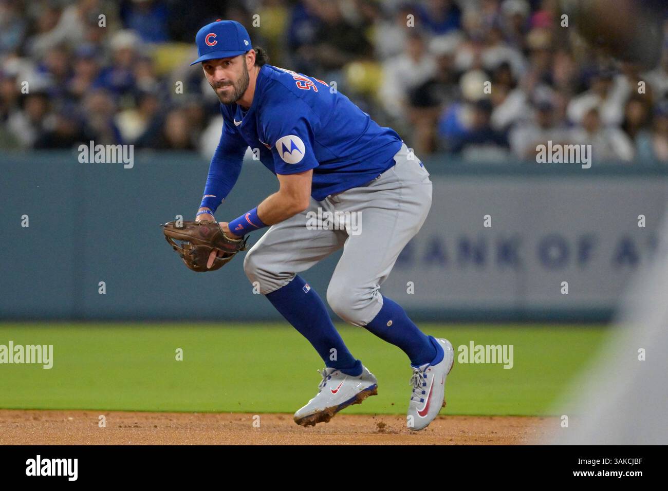 Chicago Cubs shortstop Dansby Swanson makes a play during a baseball ...