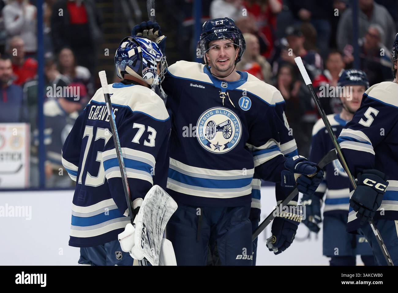 Columbus Blue Jackets goaltender Jet Greaves (73) celebrates with ...