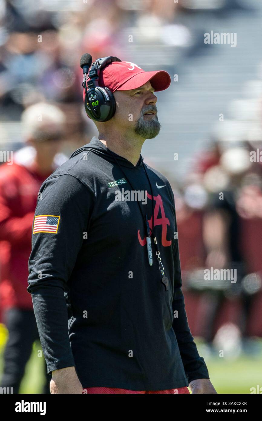 Alabama offensive coordinator Ryan Grubb tracks his passing game drills during Alabama's A-Day ...