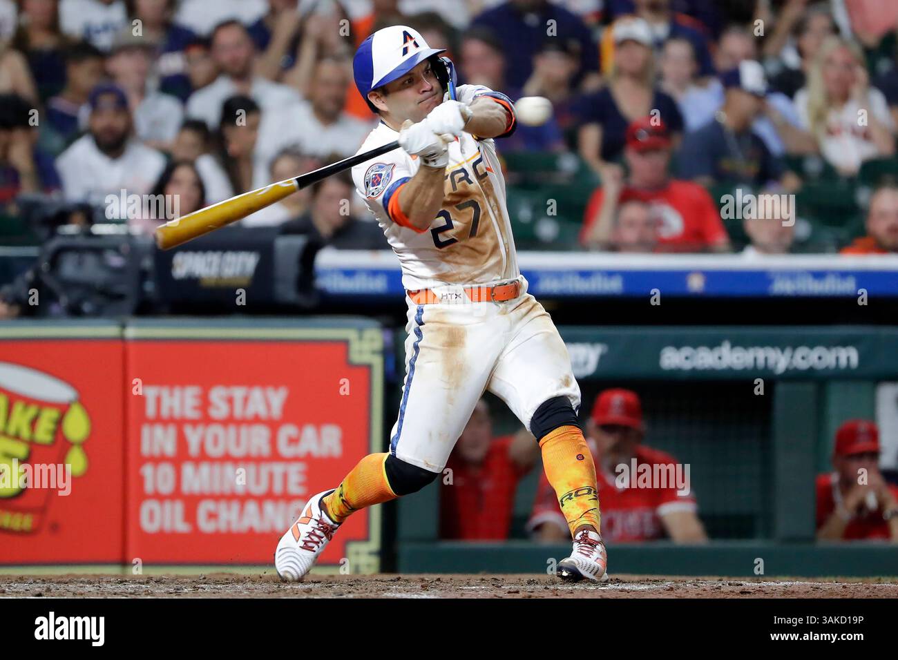 Houston Astros left fielder Jose Altuve swings for a single against Los ...