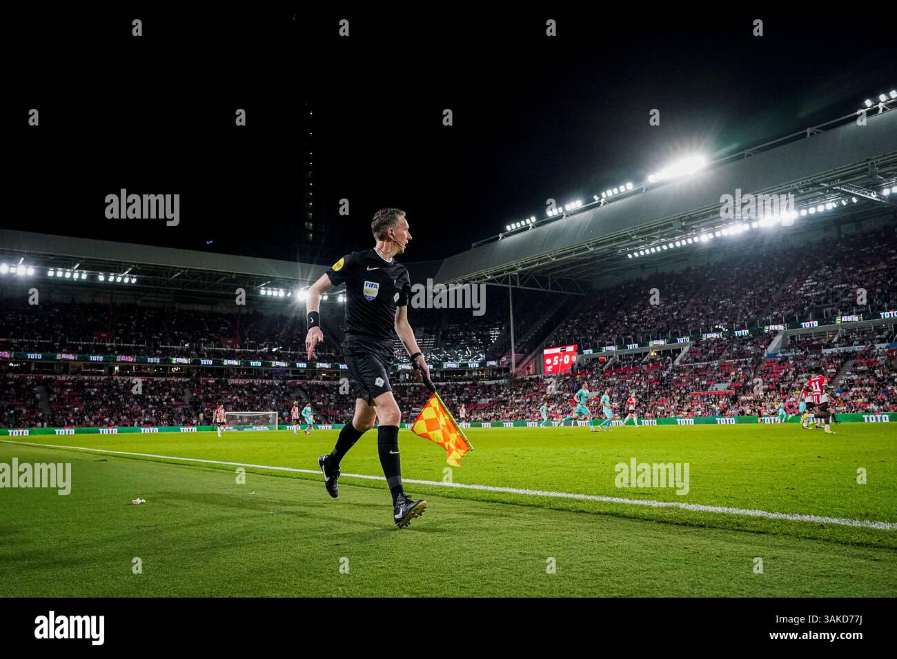 EINDHOVEN, NETHERLANDS - APRIL 12: Assistant Referee Johan Balder looks ...