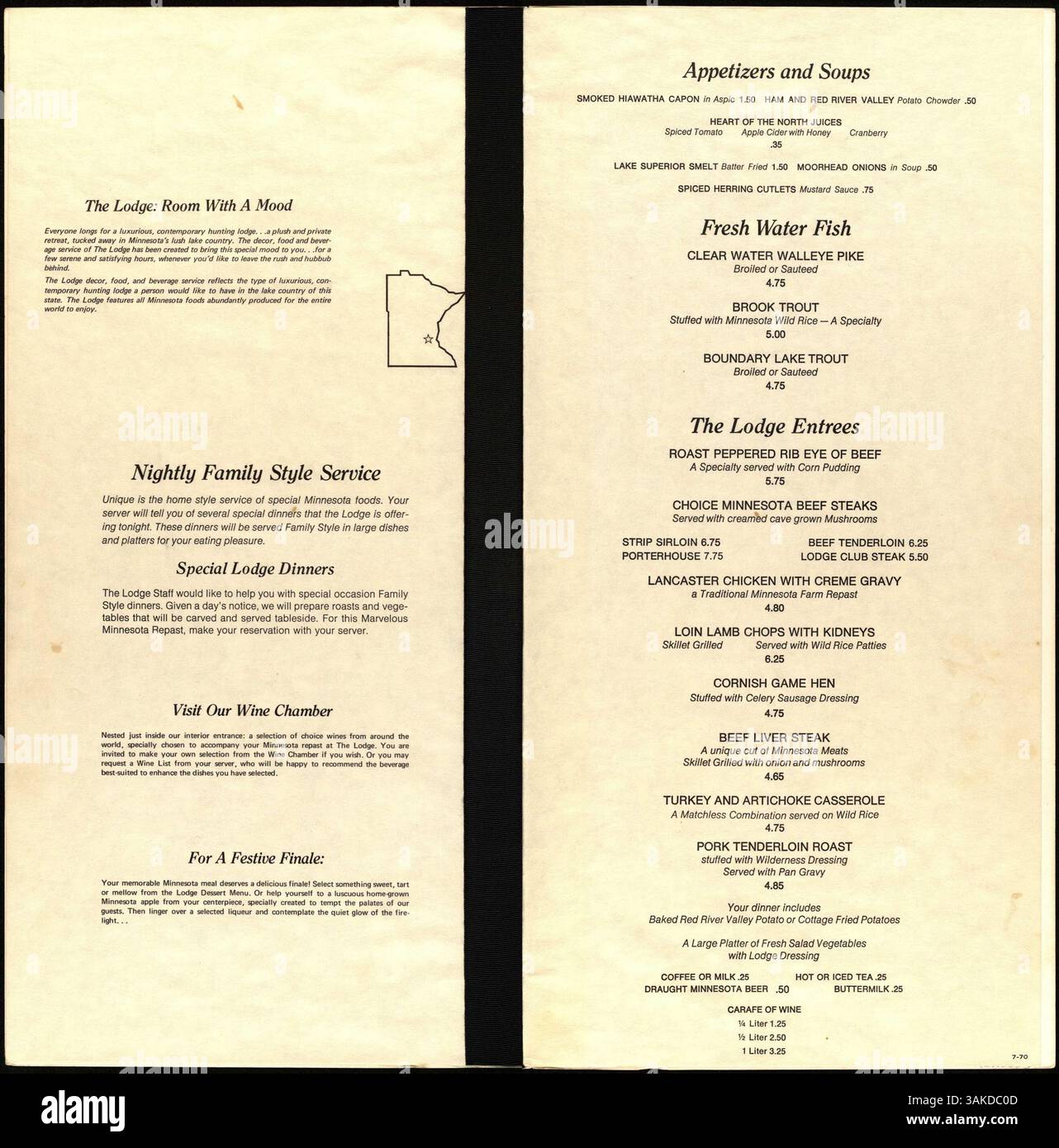 A bi-fold menu with parchment inserts and a black ribbon binding ...