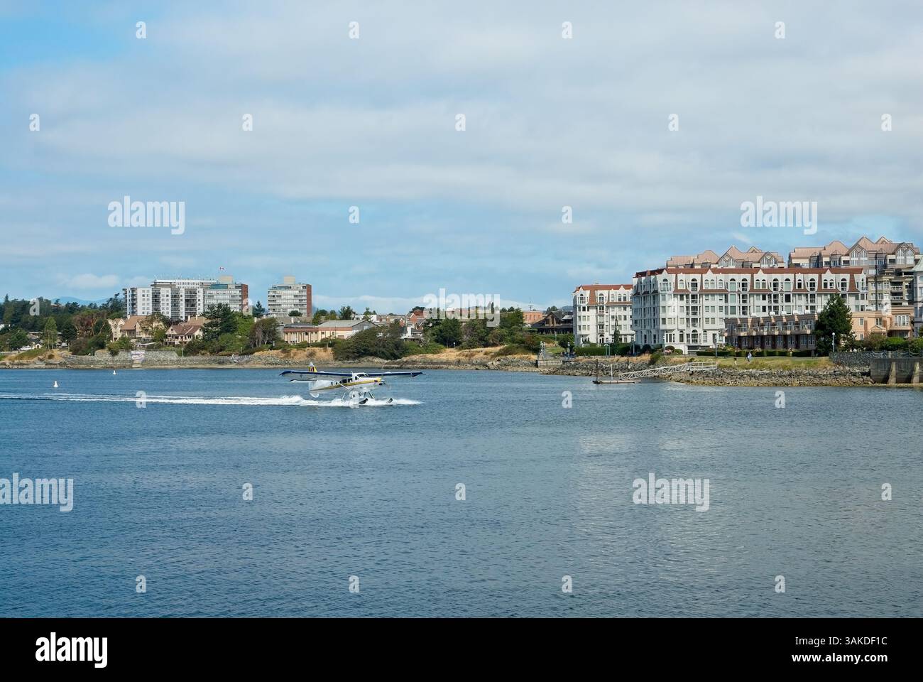 Seaplane landing on Port of Victoria waters at Vancouver Island ...