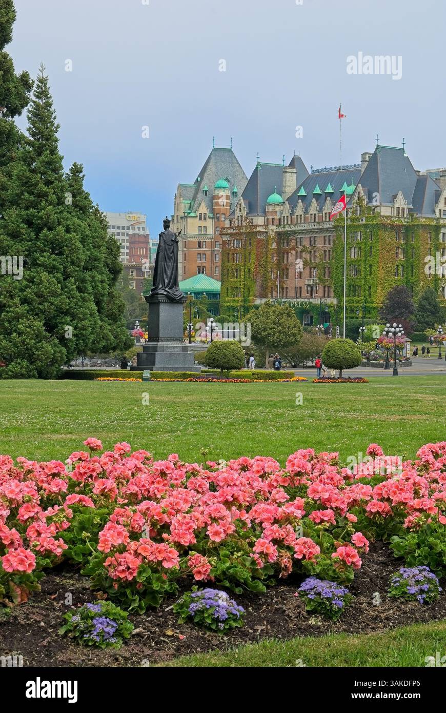 Landscaped grounds of British Columbia Parliament Buildings with Queen ...