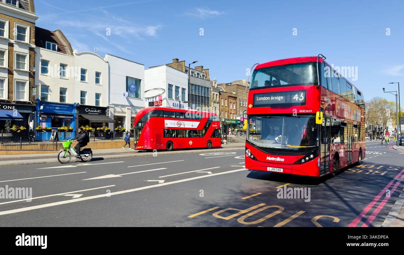 London, UK - April 2, 2025; Red double decker London buses in Angel ...