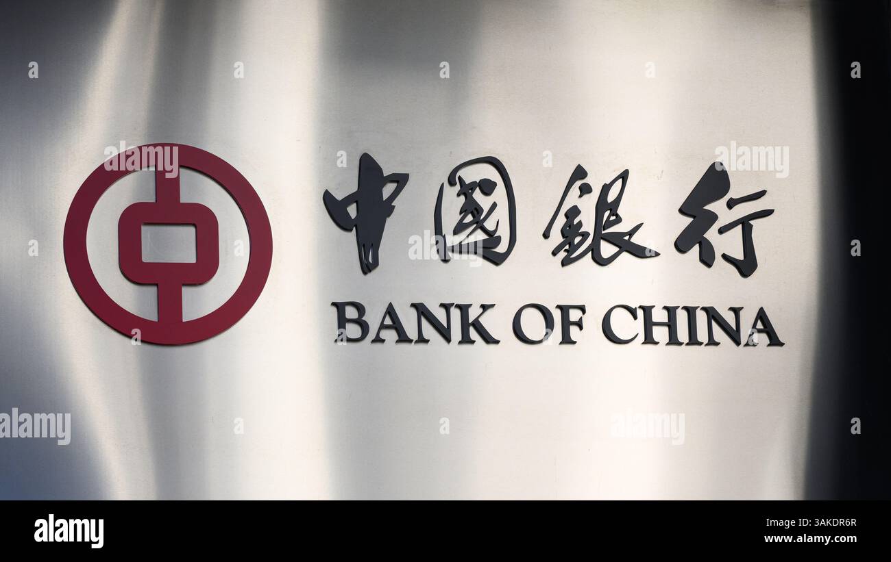 London, UK - April 2, 2025; Sign in multiple languages at Bank of China ...