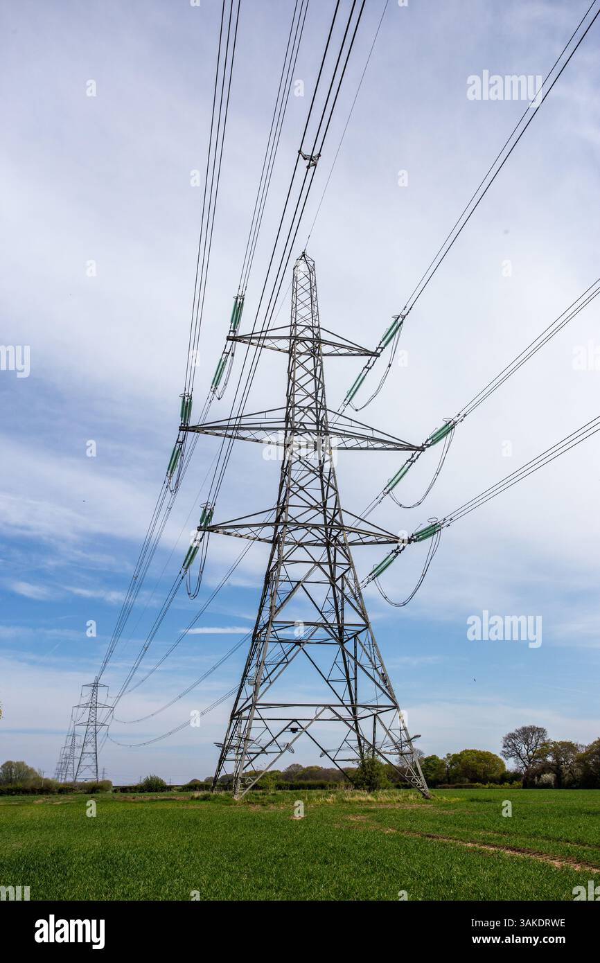 Electricity pylons and power lines crossing the English rural ...