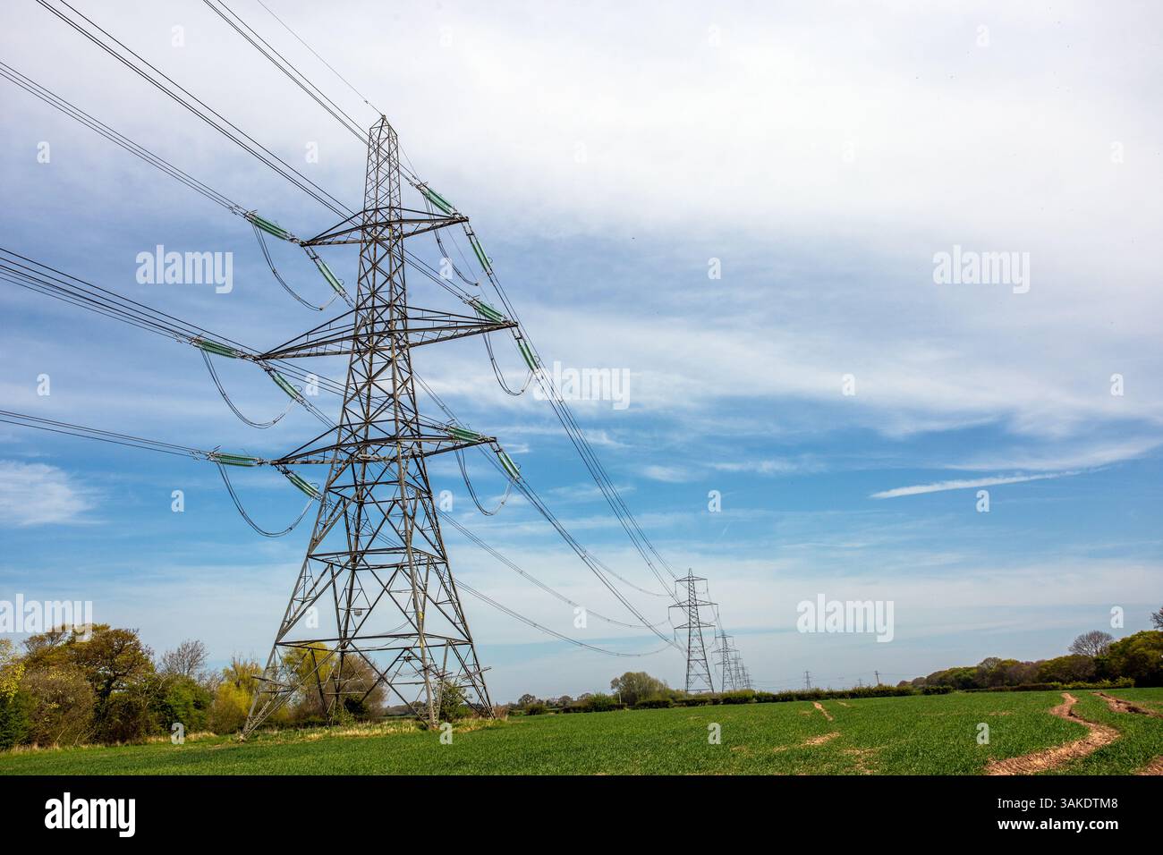 Electricity pylons and power lines crossing the English rural ...