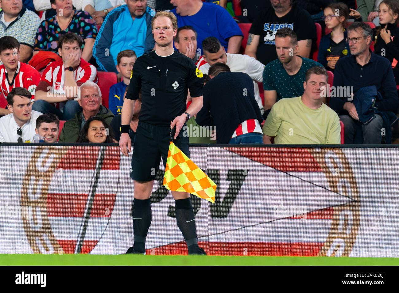 EINDHOVEN, NETHERLANDS - APRIL 12: Assistant referee Frans Ozinga ...