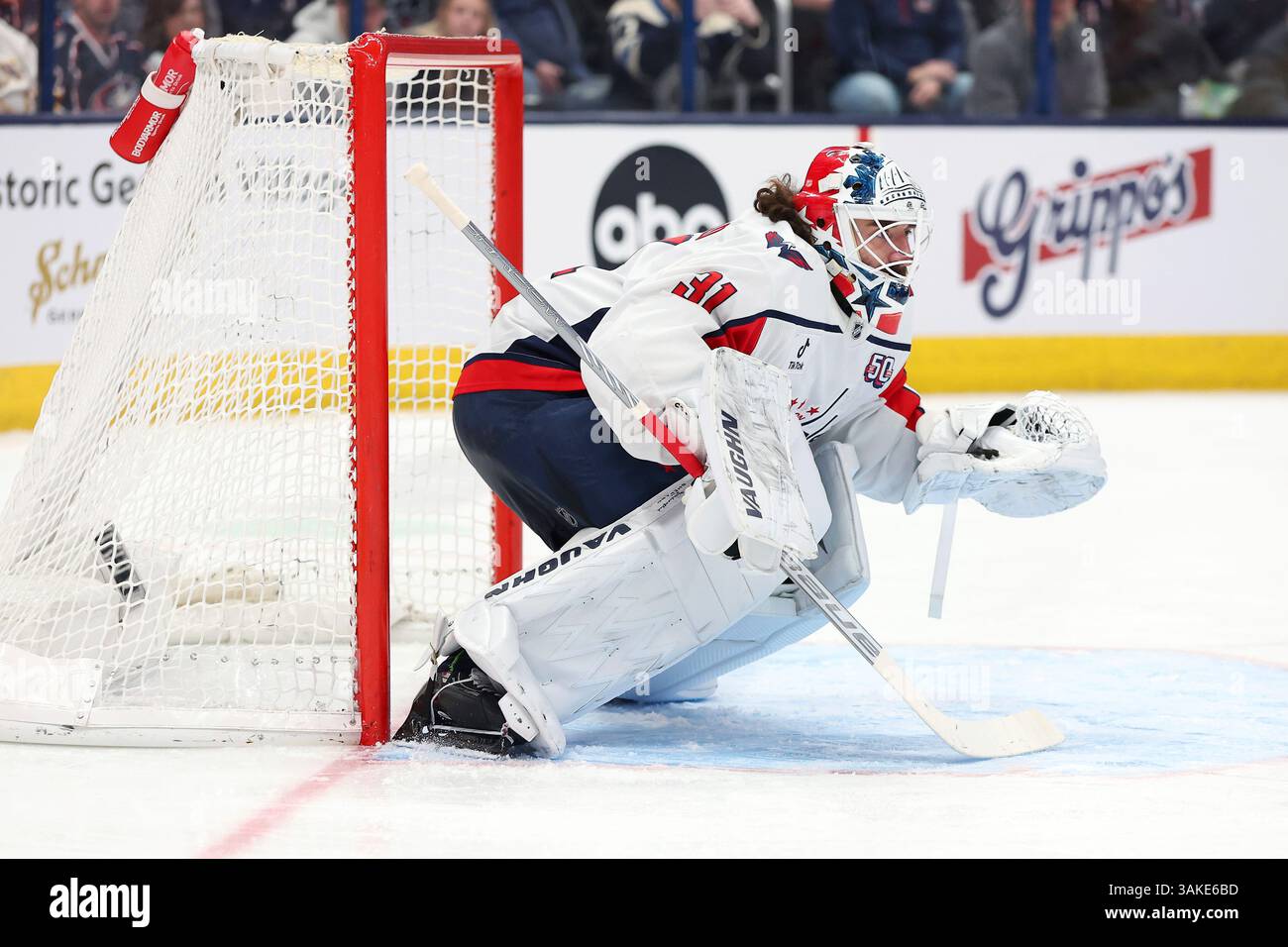 Washington Capitals goaltender Hunter Shepard (31) looks for the puck ...