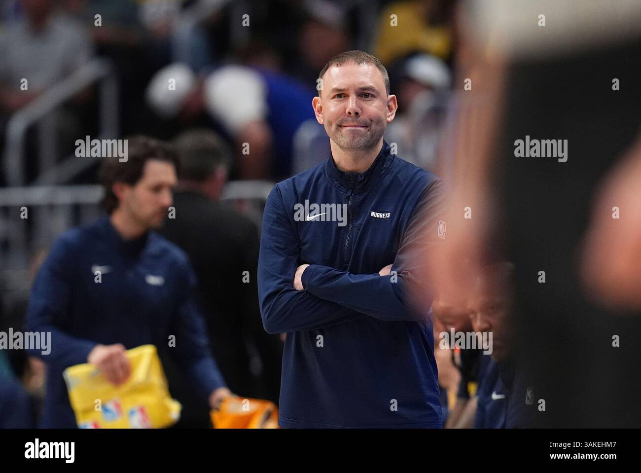 Denver Nuggets interim head coach David Adelman () in the first half of ...