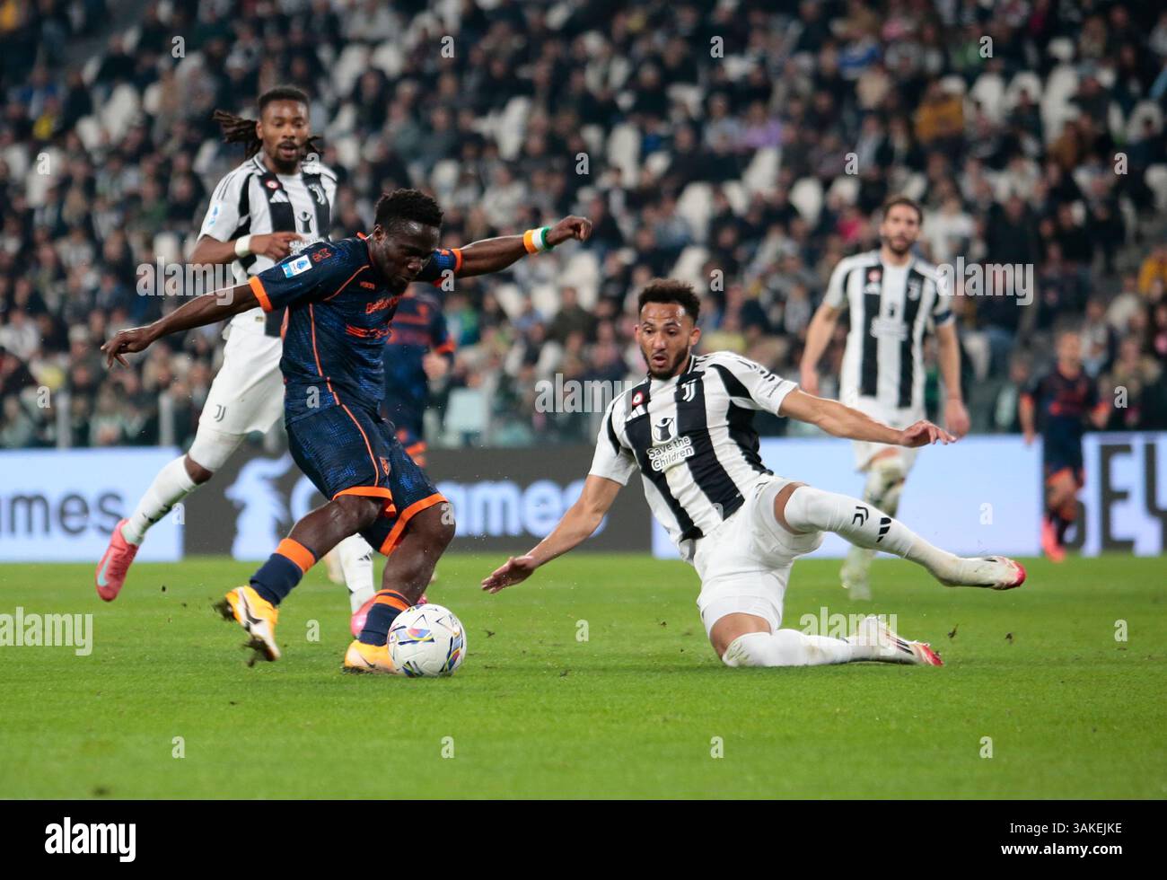 Turin, Italy. 12th Apr, 2025. Konan N'Dri of US Lecce and Lloyd Kelly ...
