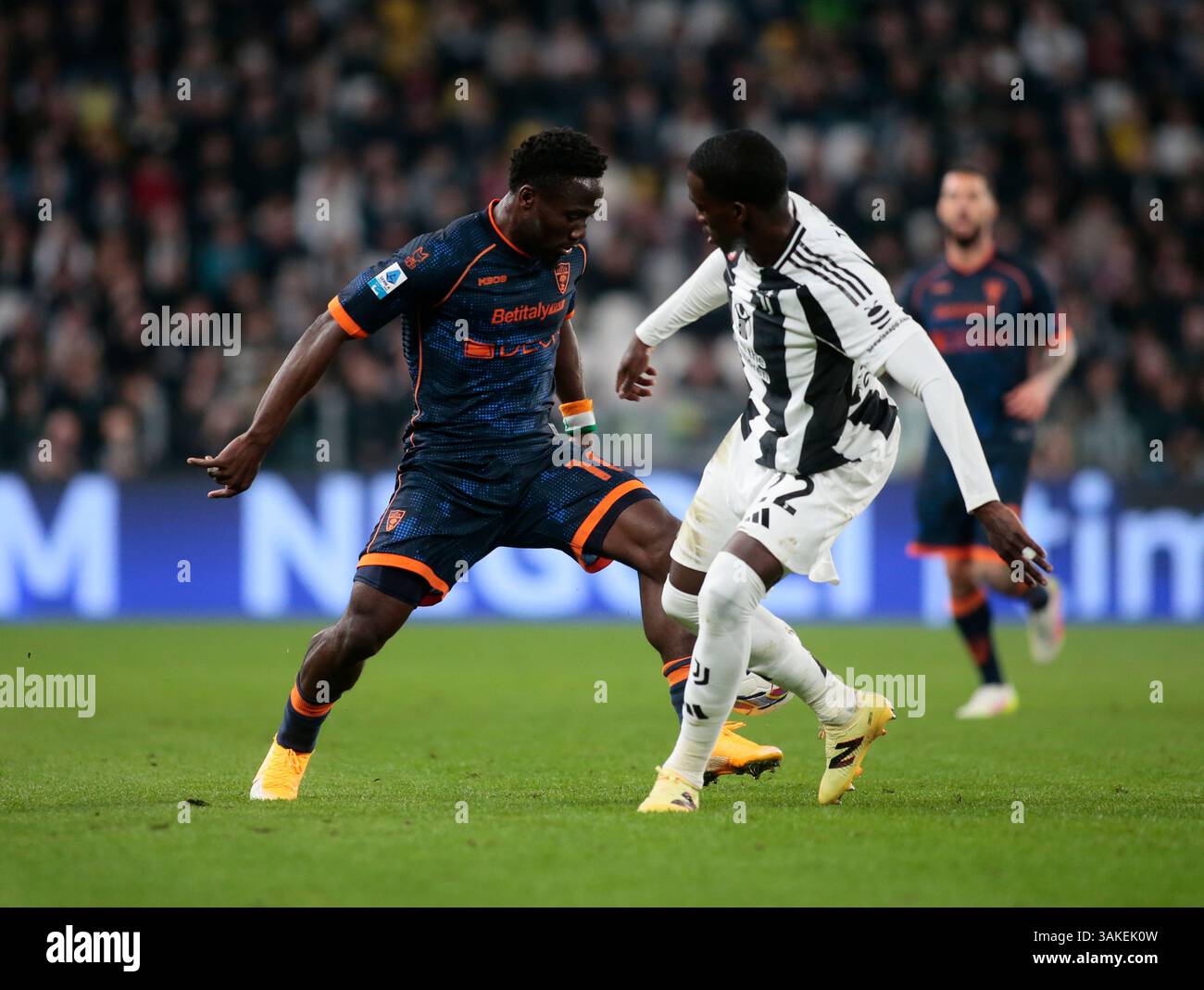 Turin, Italy. 12th Apr, 2025. Konan N'Dri of US Lecce and Timothy Weah ...