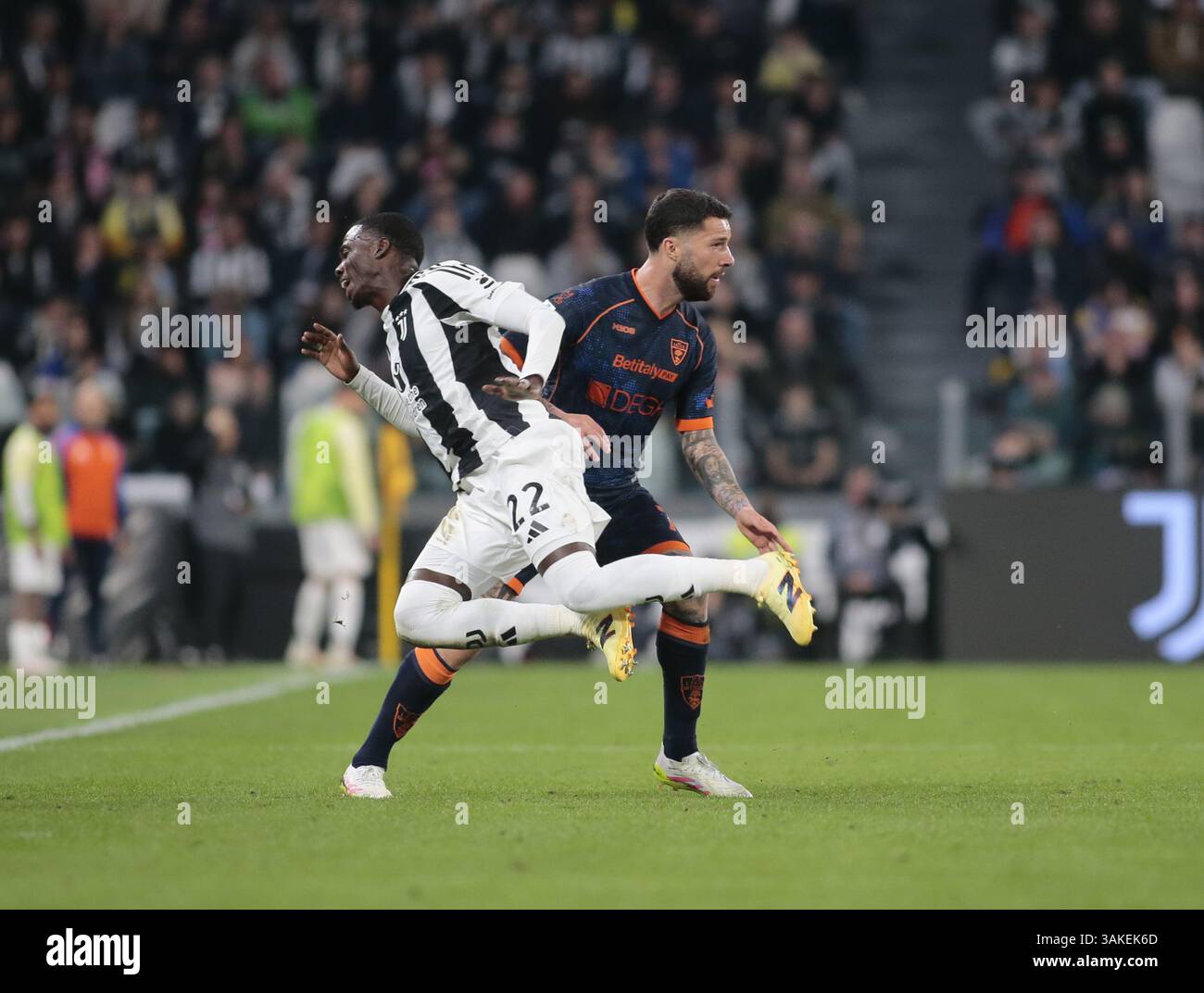 Turin, Italy. 12th Apr, 2025. Timothy Weah of Juventus FC and Danilo ...