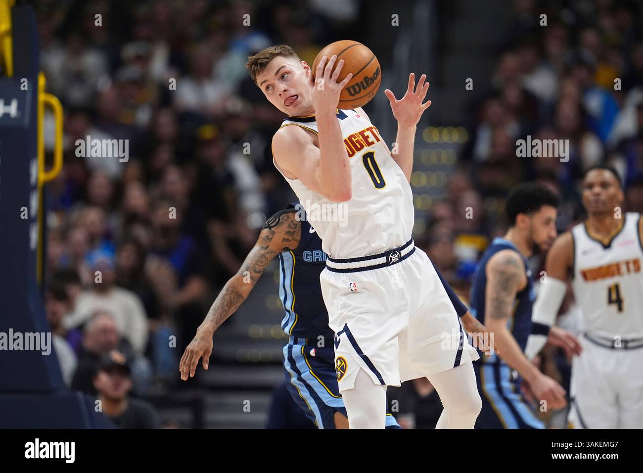 Denver Nuggets forward Hunter Tyson (5) pulls in loose ball as Memphis ...