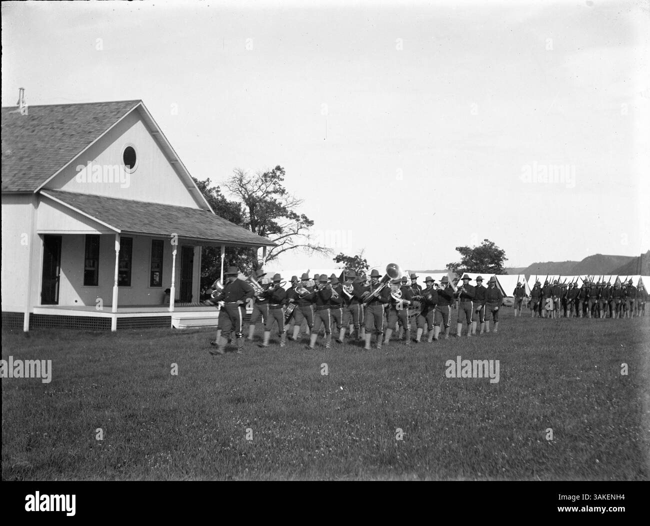 A military band leads soldiers in a drill at Camp Lakeview, located on ...