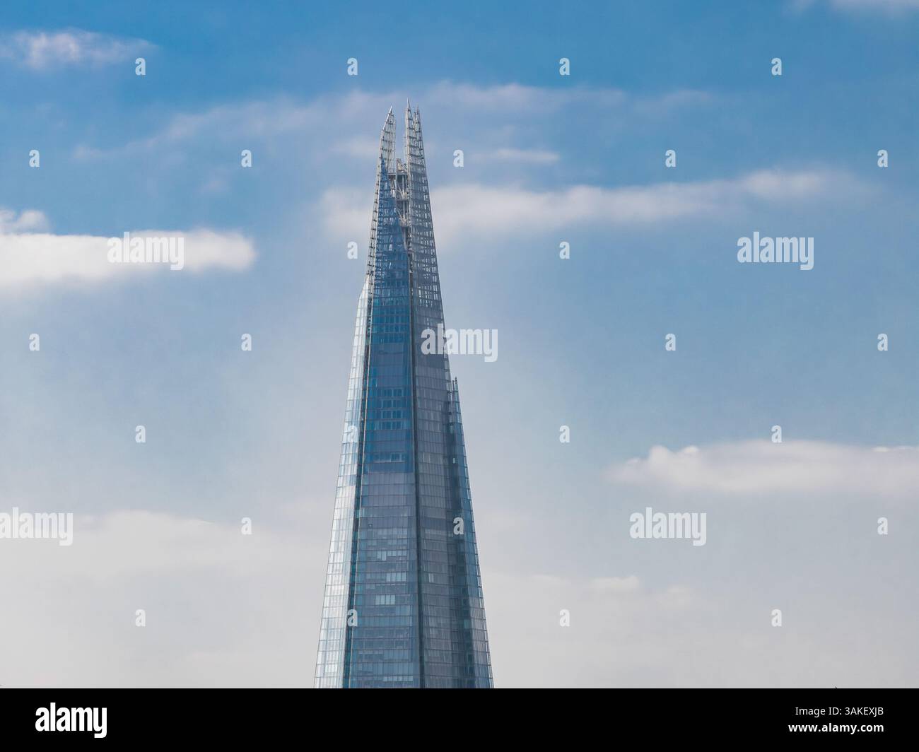 The Shard Skyscraper Against a Clear Blue Sky in London, UK Stock Photo ...