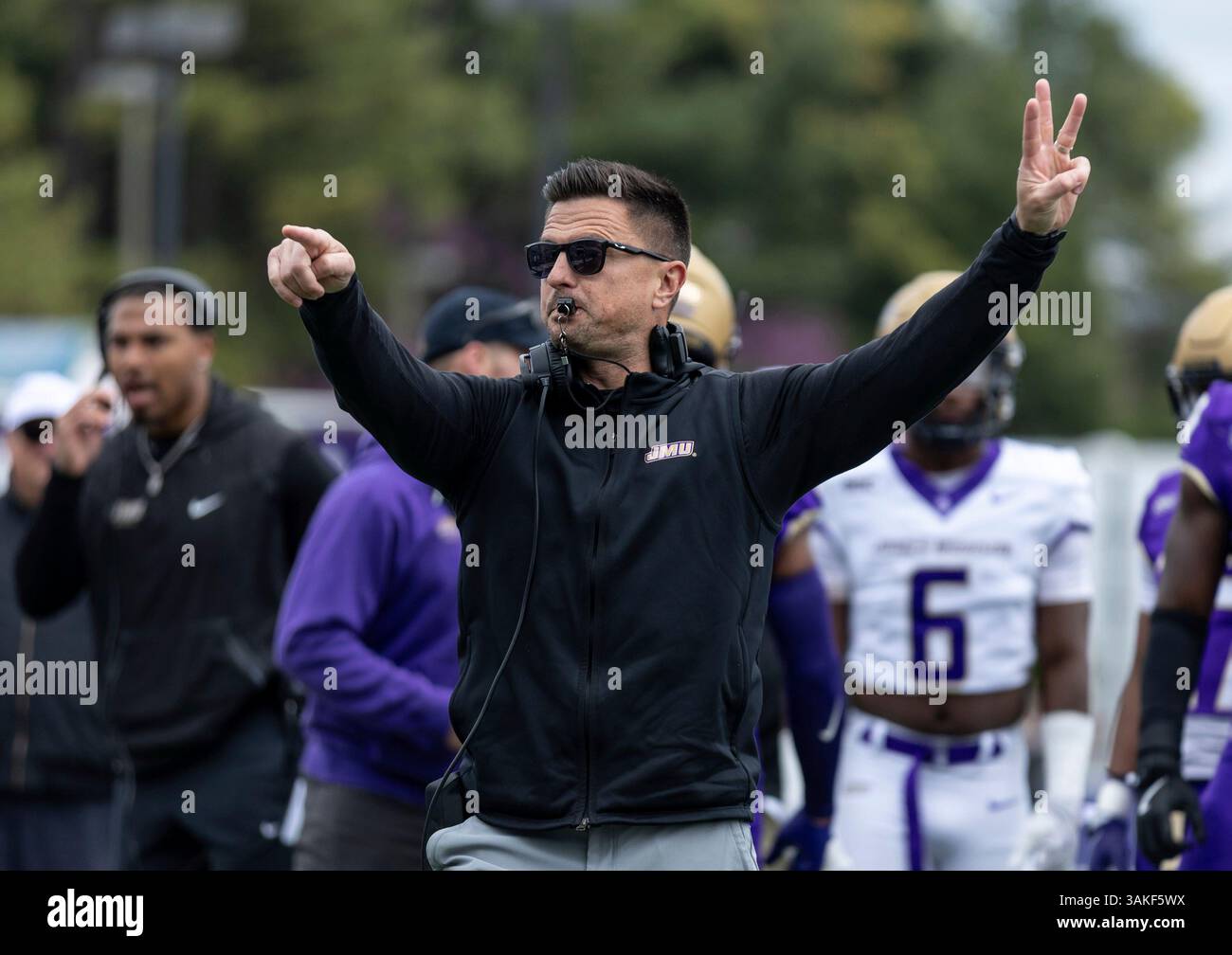 James Madison head coach Bob Chesney directs his team during an NCAA ...