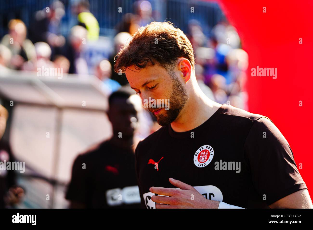 Kiel, Deutschland. 12th Apr, 2025. Carlo Boukhalfa (FC St. Pauli, #16 ...