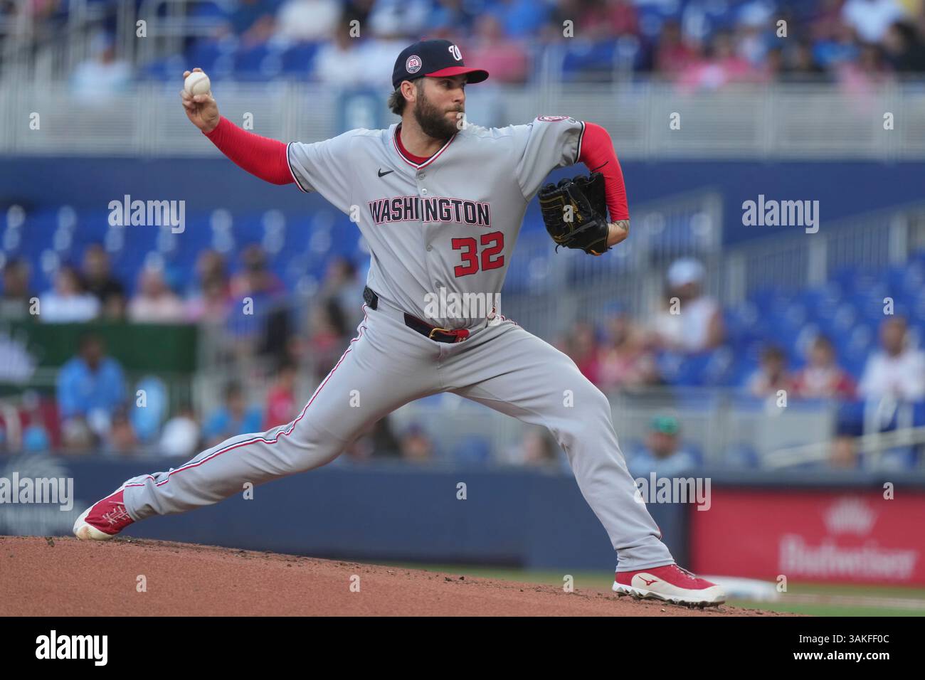 Washington Nationals pitcher Trevor Williams (32) aims a pitch during ...