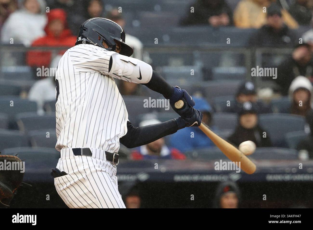 New York Yankees' Cody Bellinger hits a single scoring Ben Rice in the ...