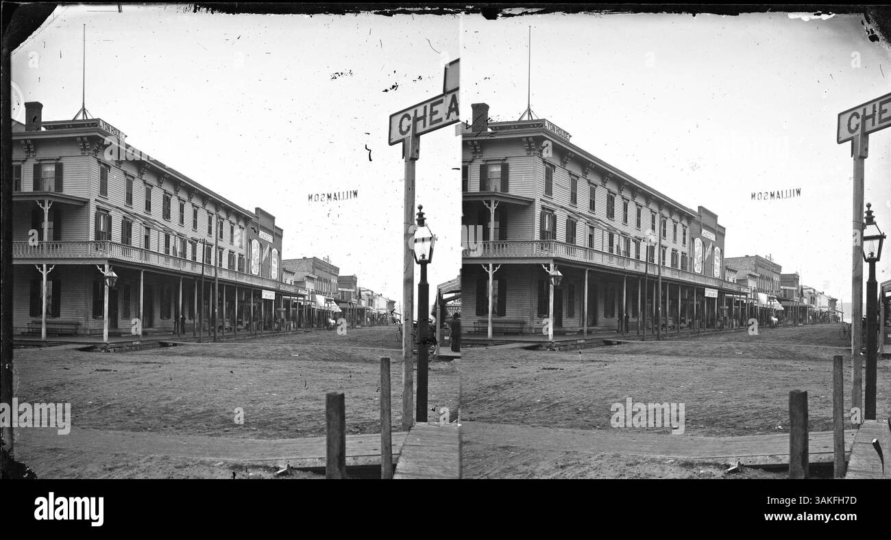 A view looking down a street towards the lake, showcasing Lyon House in ...