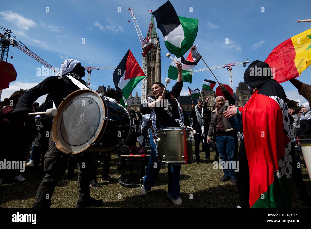 Ottawa, Canada. 12th Apr, 2025. Pro-Palestinian protestors drum on ...